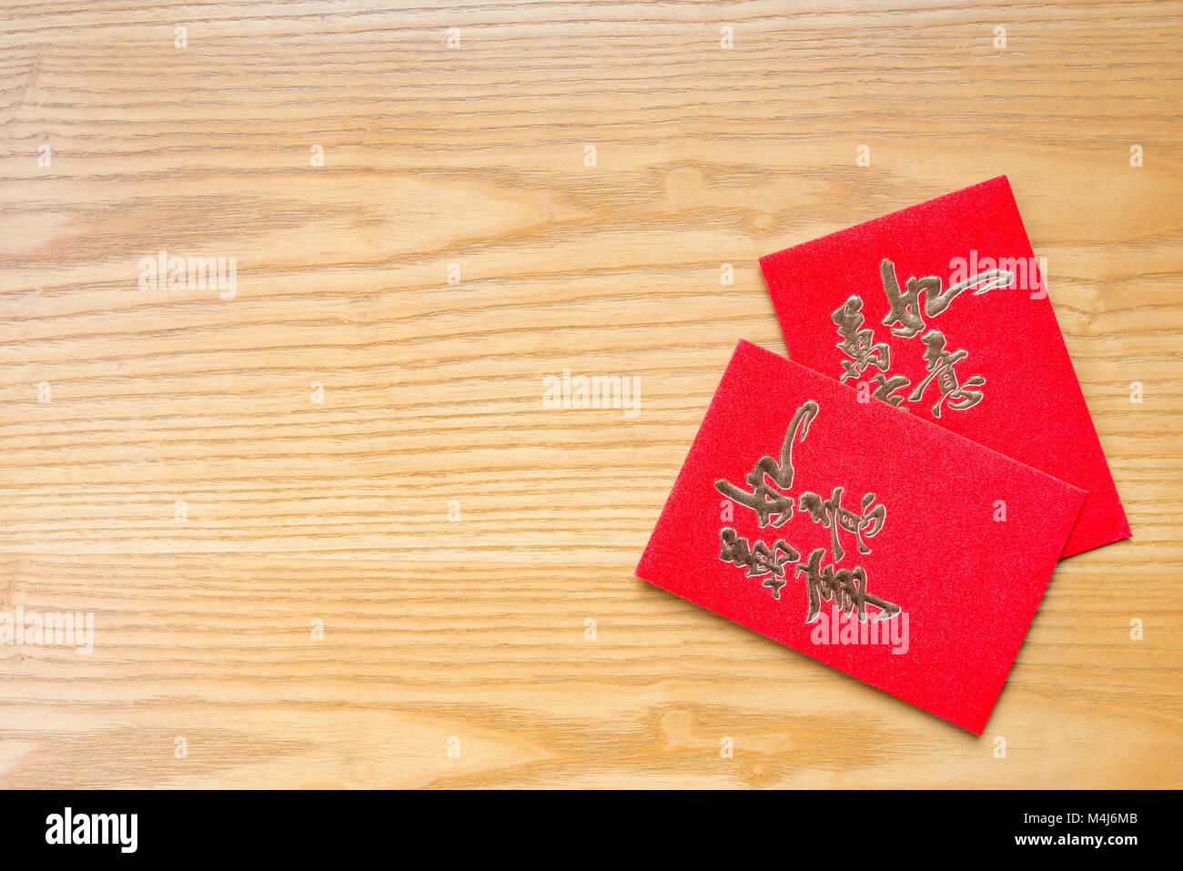 traidtional Chinese red pockets on table with copy space the Chinese ...