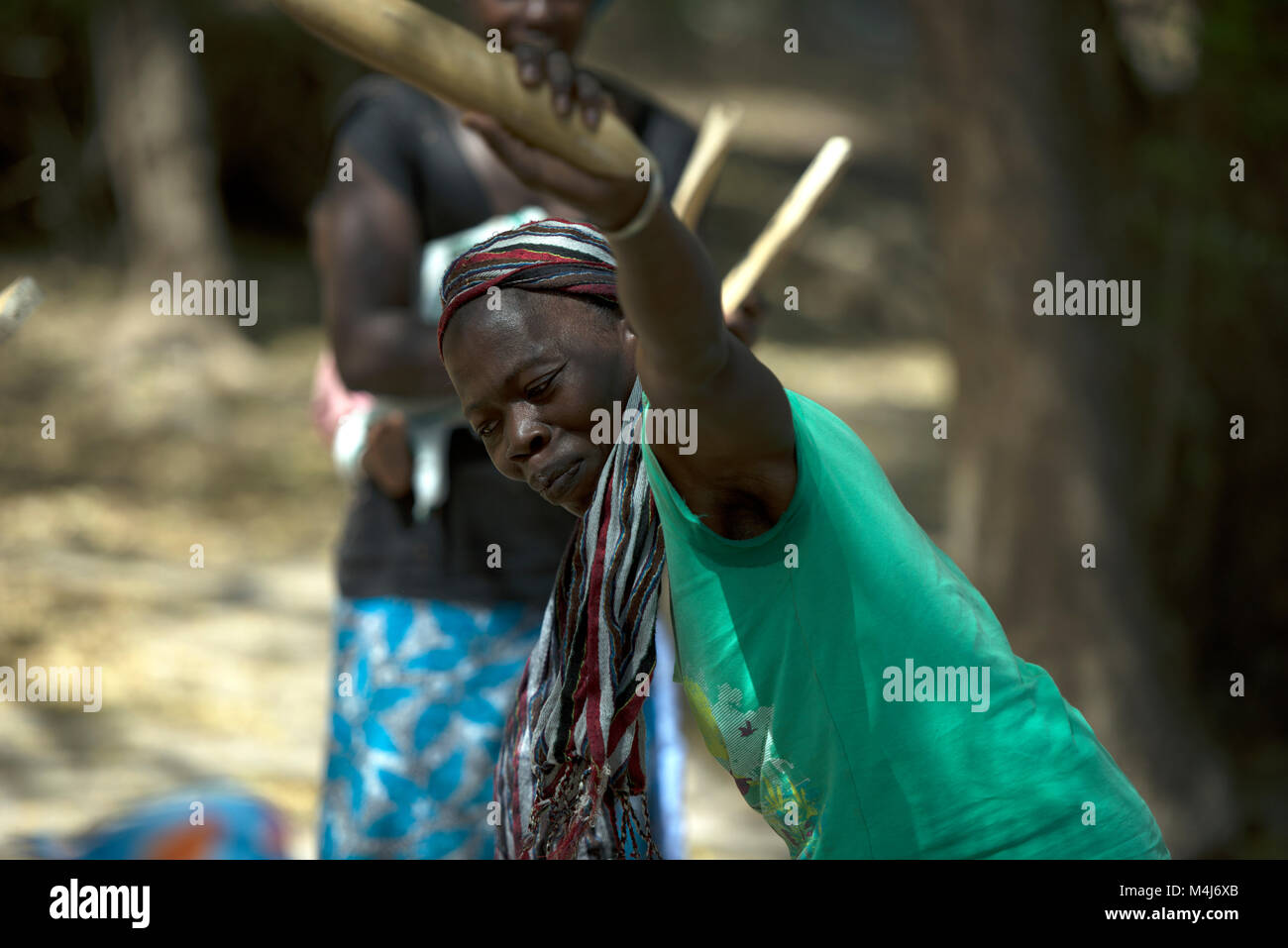 An ethnic Mandingo (Mandinka) woman dances during a traditional ...
