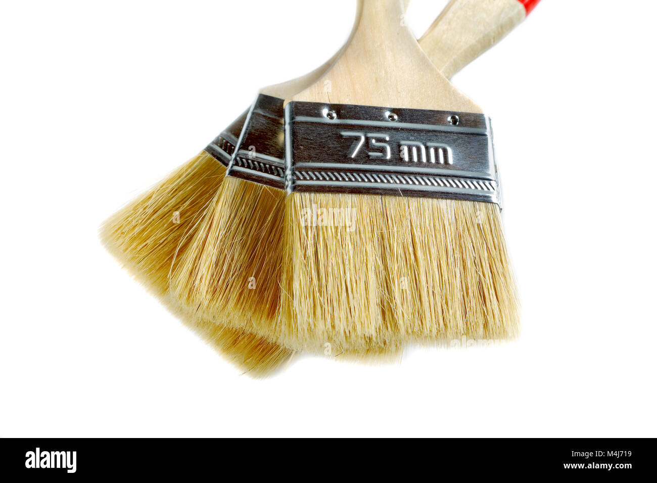 Three paint brushes isolated on white background Stock Photo - Alamy