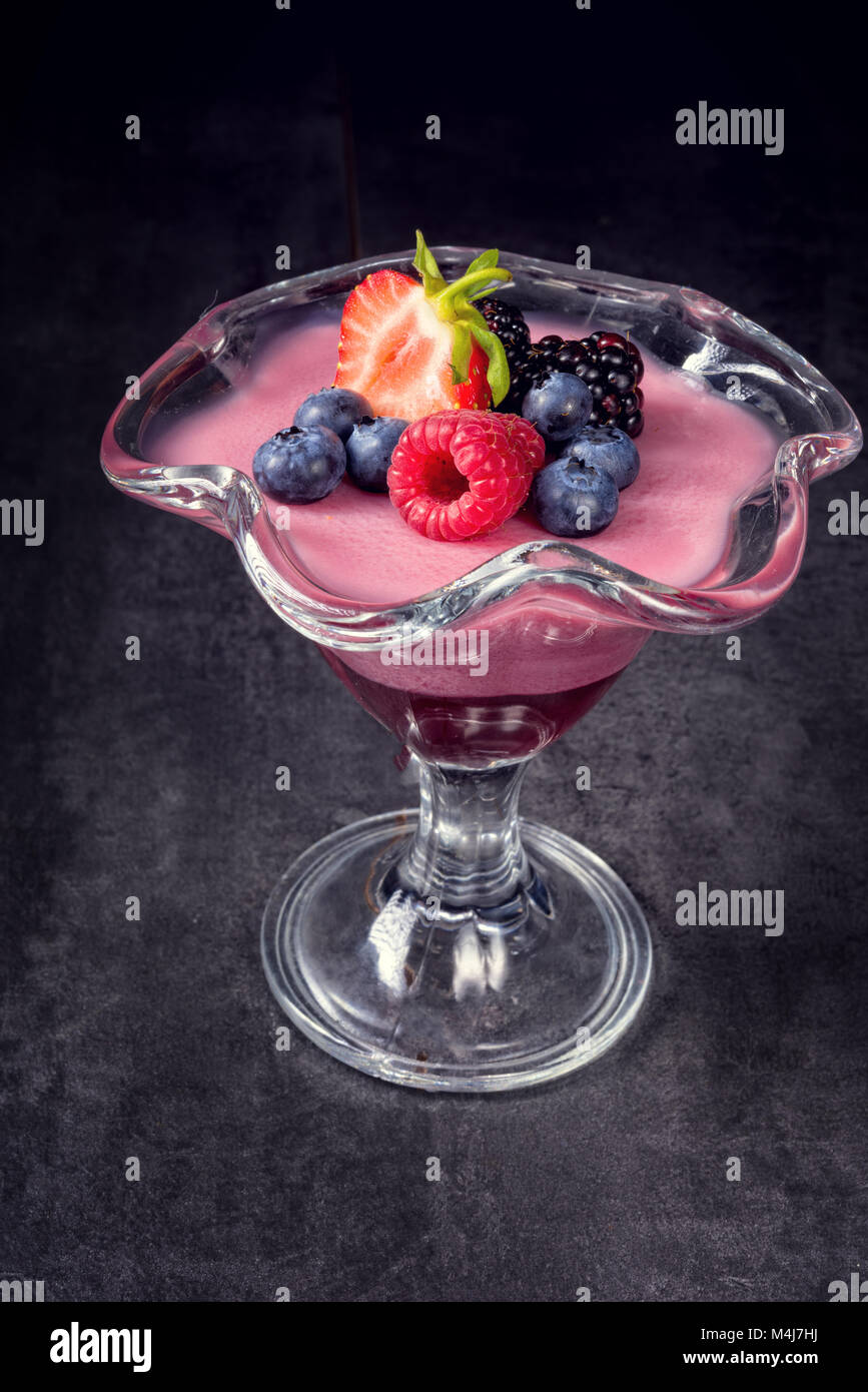 delicious pudding with wild berry Stock Photo - Alamy