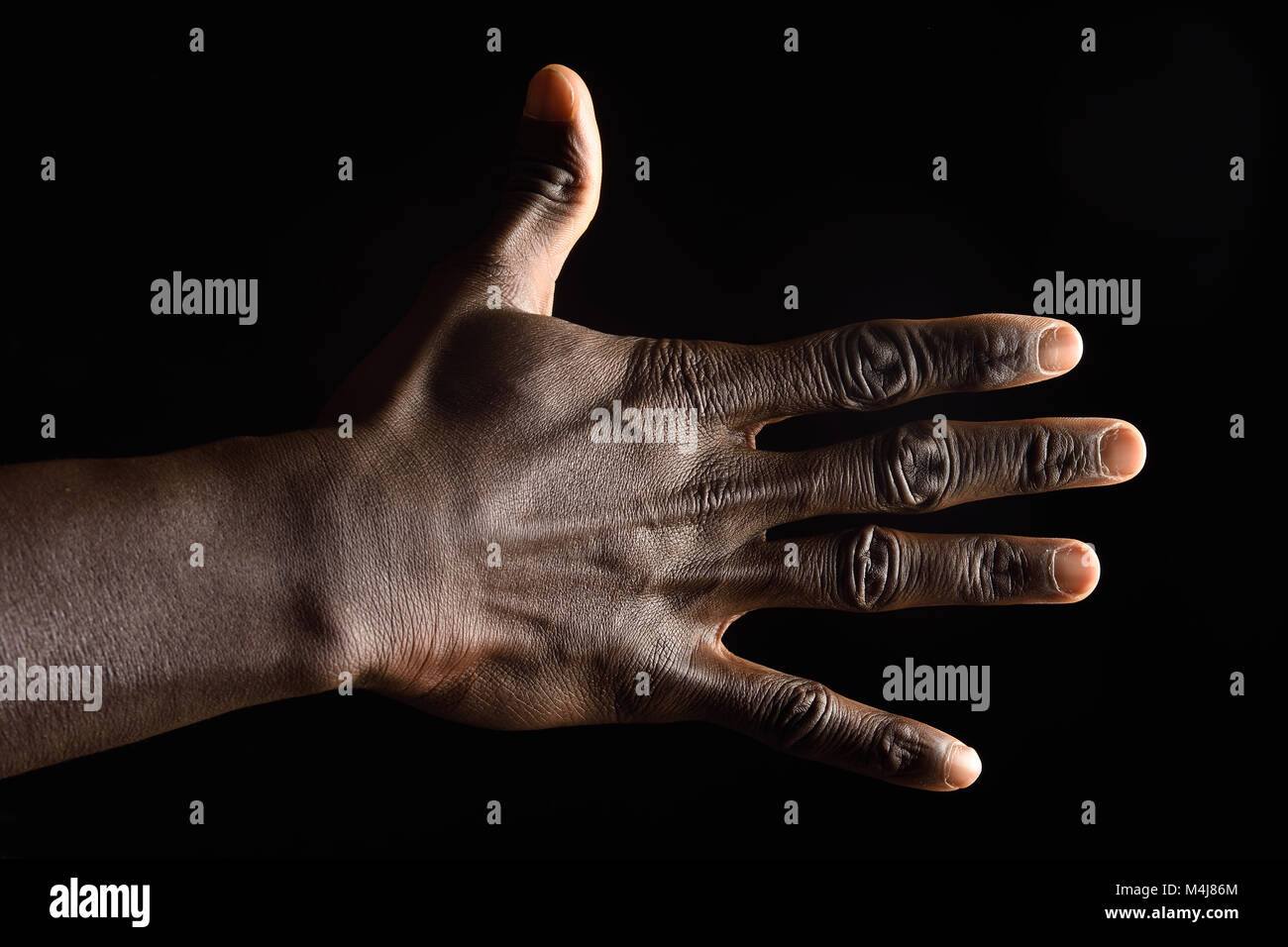 hand of an african man on white Stock Photo - Alamy