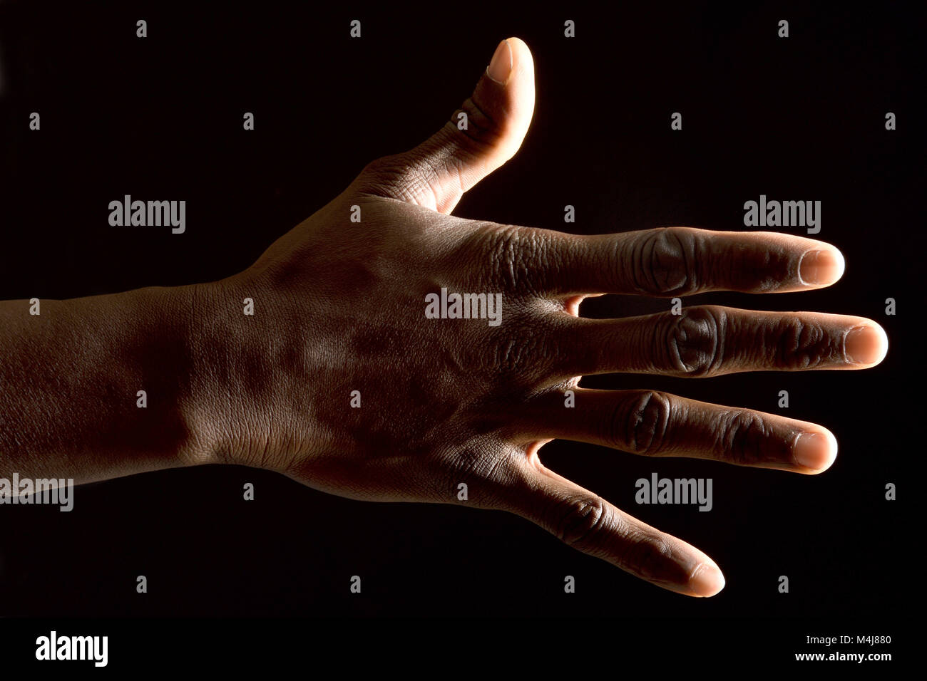 Open hands african american giving hi-res stock photography and images ...