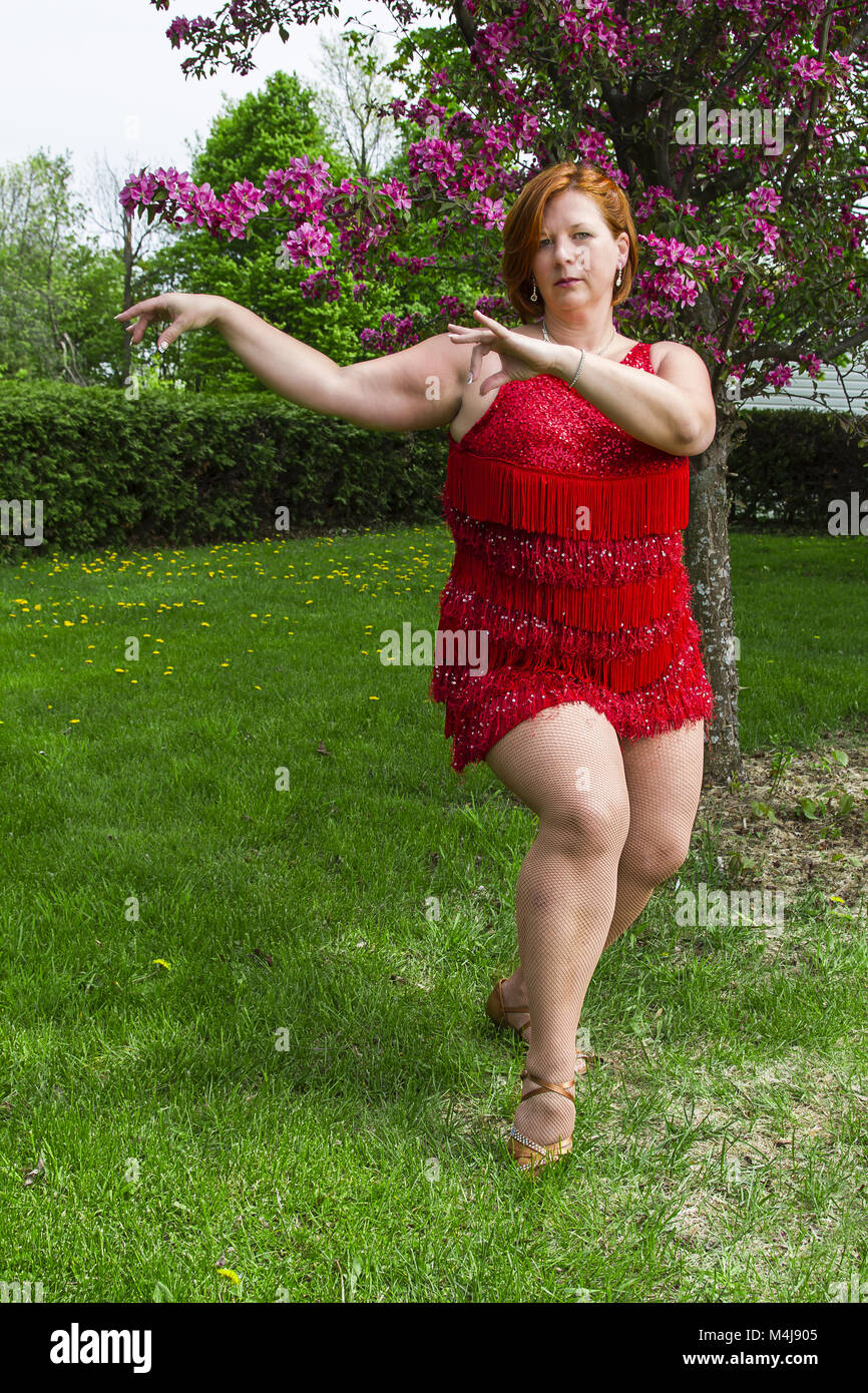 Woman dancing outside Stock Photo - Alamy