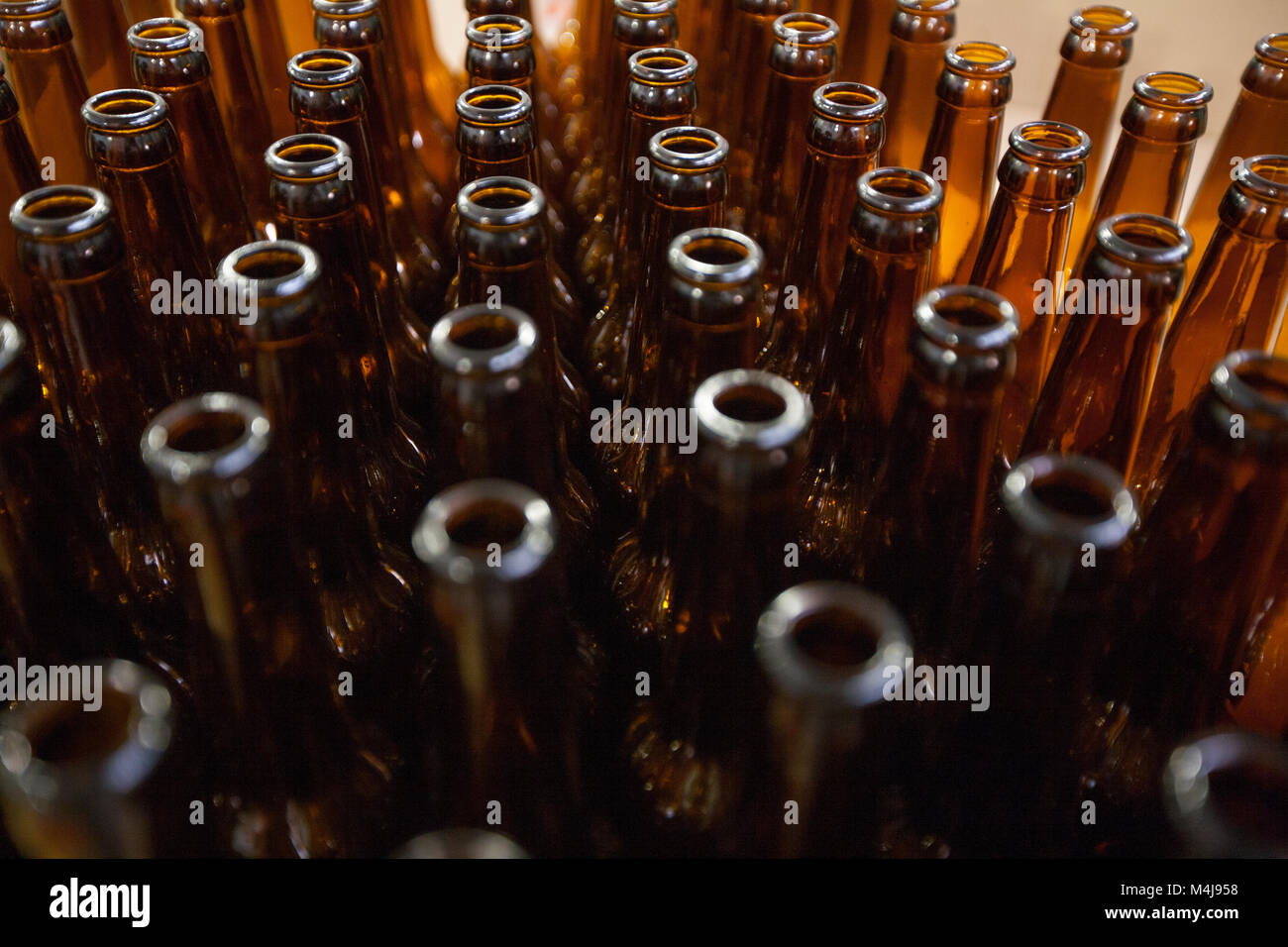 Empty glass beer bottles, the top view Stock Photo - Alamy