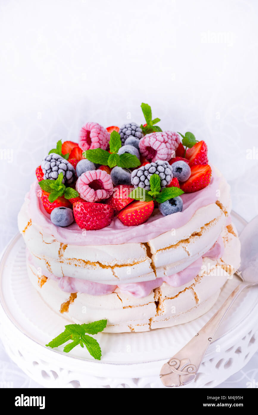 Pavlova with berry fruits Stock Photo - Alamy