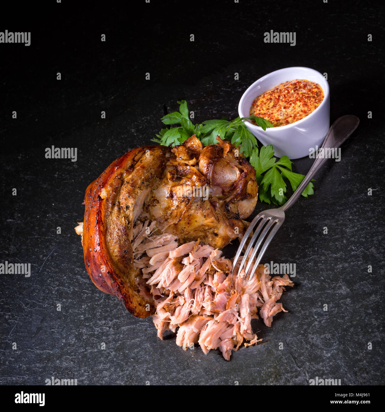 fresh roasted knuckle of pork with mustard Stock Photo - Alamy