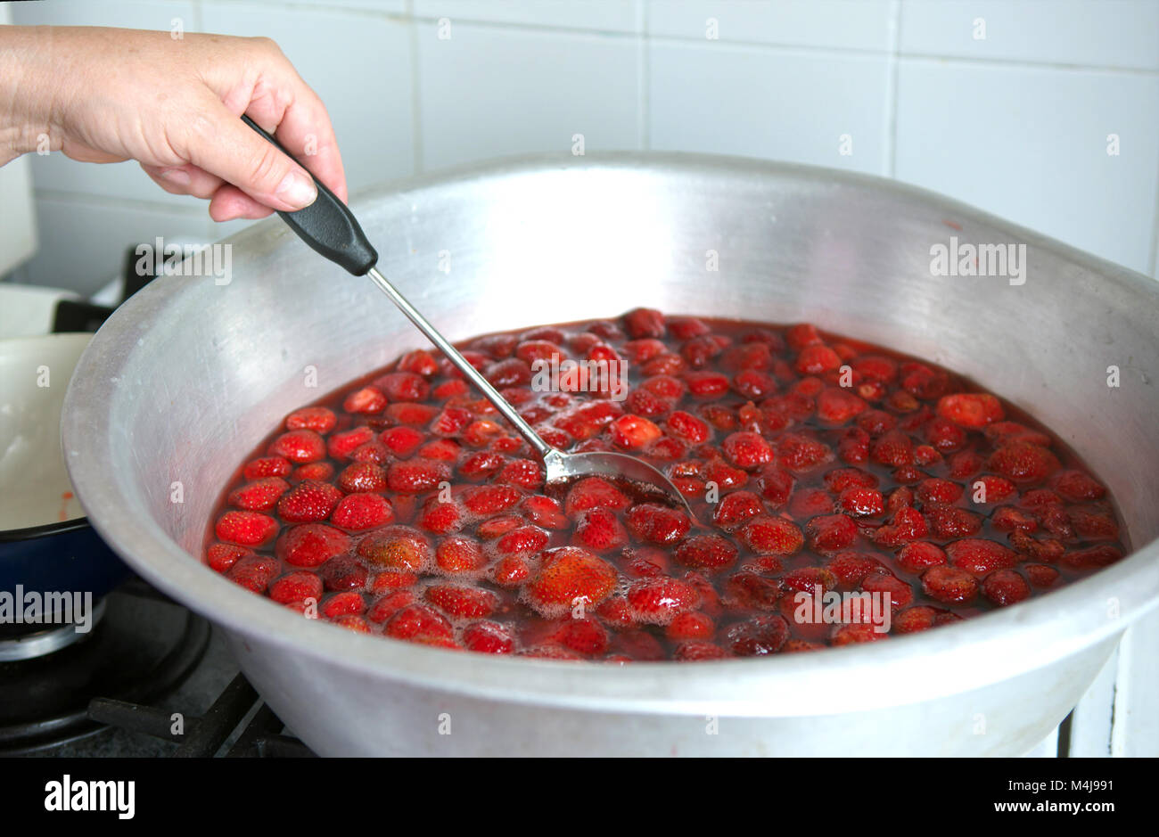 Preparation of strawberry jam in the home Stock Photo - Alamy