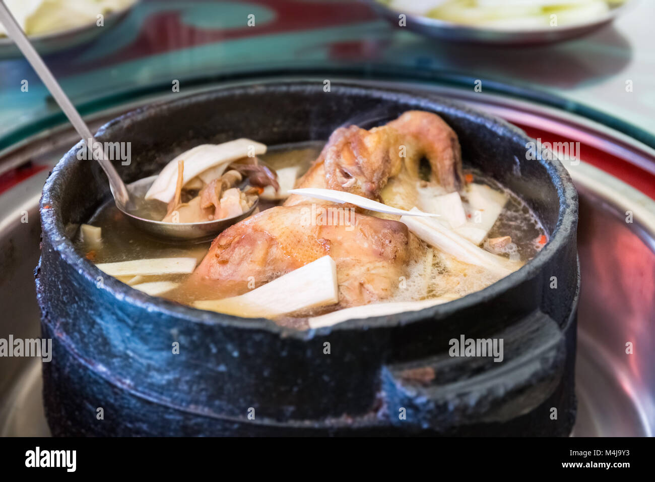 stone pot of chicken Stock Photo - Alamy