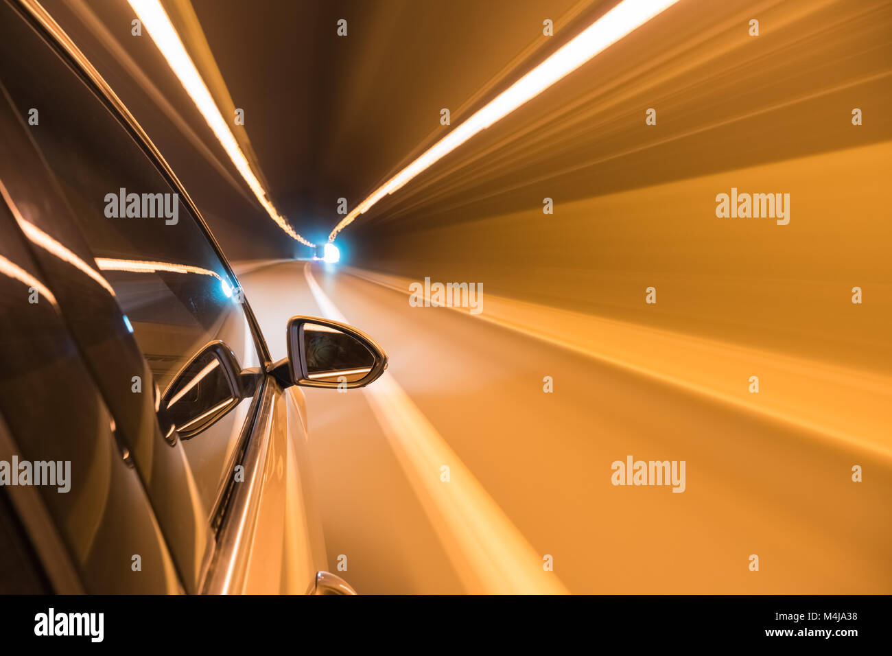 car driving fast exit the tunnel Stock Photo - Alamy