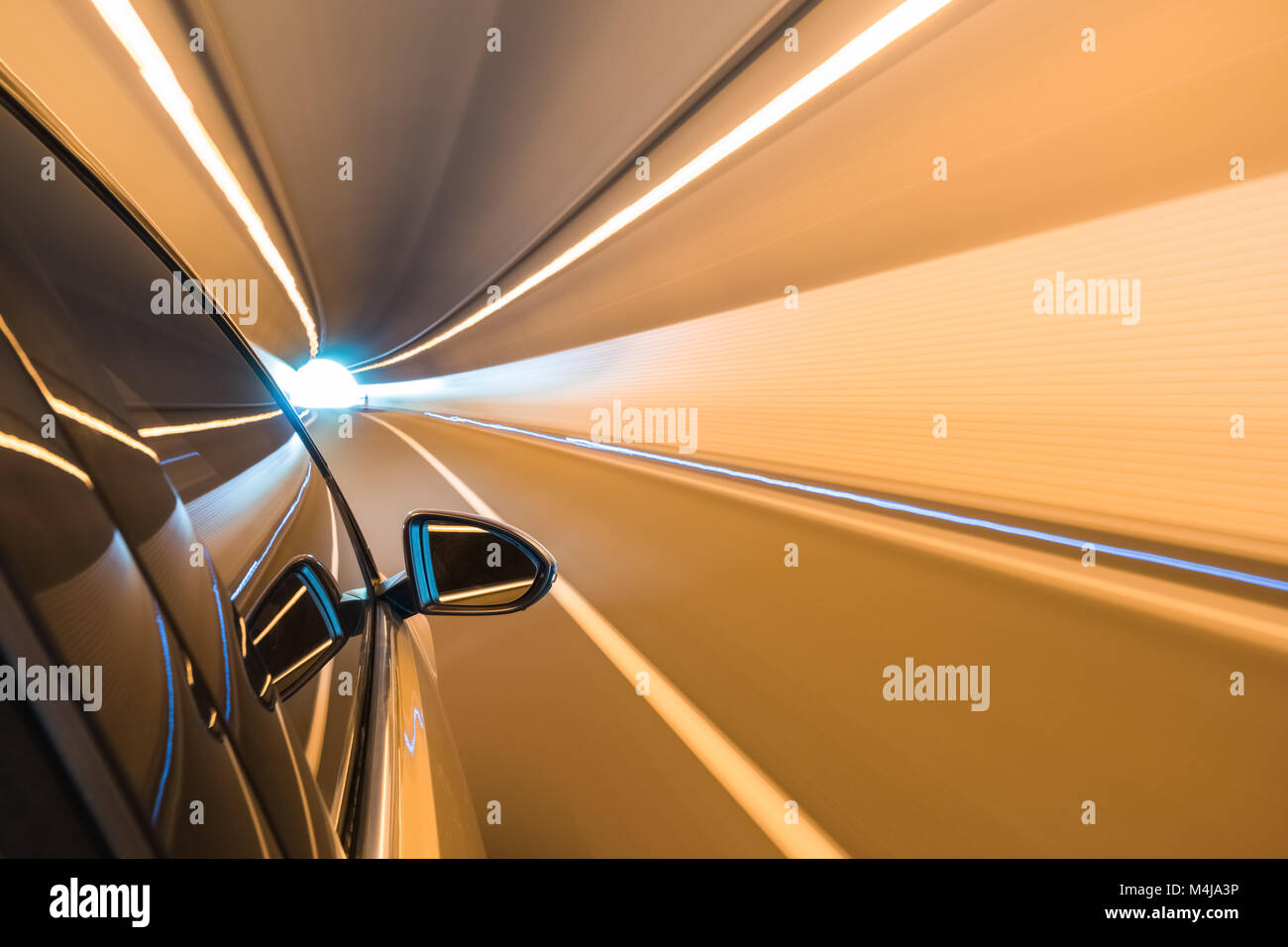 car driving fast exit the tunnel Stock Photo - Alamy