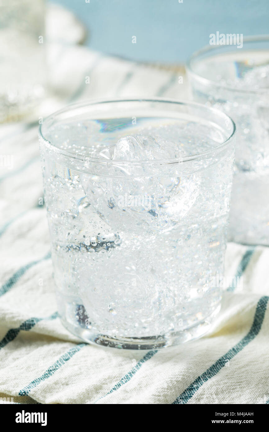Fresh Spring Sparkling Water with Ice in a Glass Stock Photo - Alamy