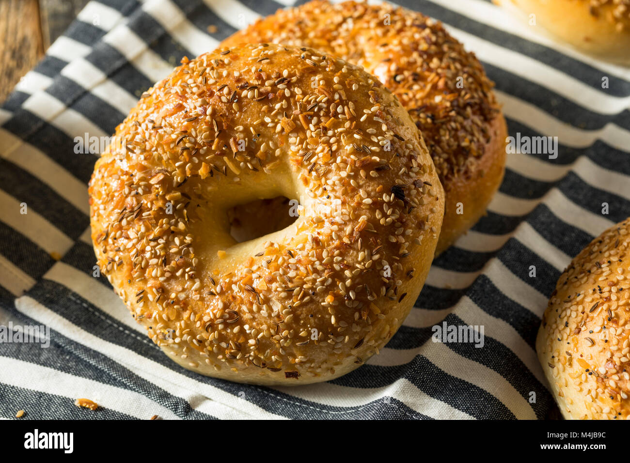 Round Warm Everything Bagels Ready to Eat Stock Photo - Alamy