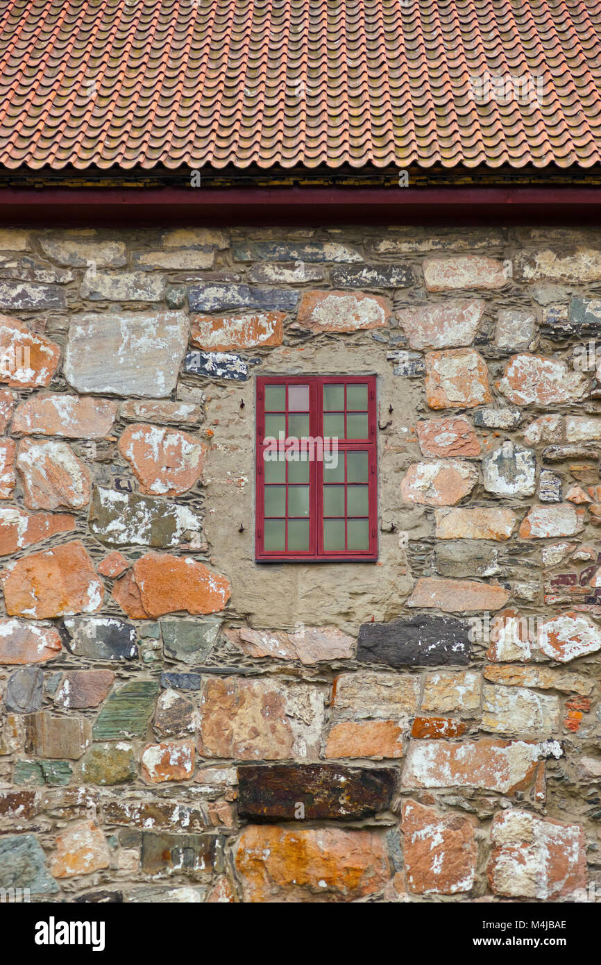 Window in stone wall Stock Photo - Alamy
