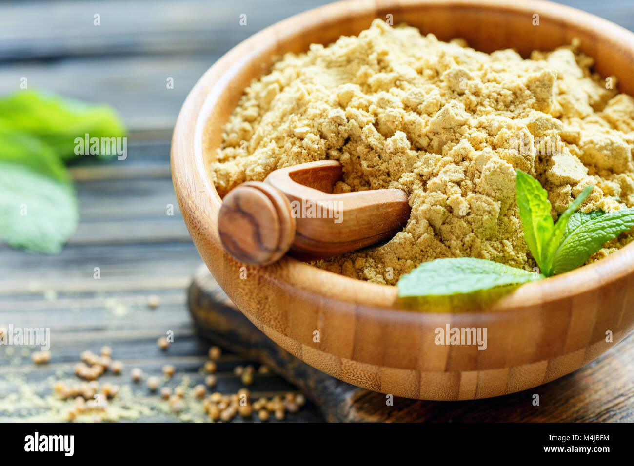 Wooden scoop mustard seeds hi-res stock photography and images - Alamy