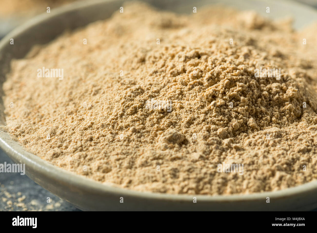 Dry Organic Maca Powder Superfood in a Bowl Stock Photo - Alamy