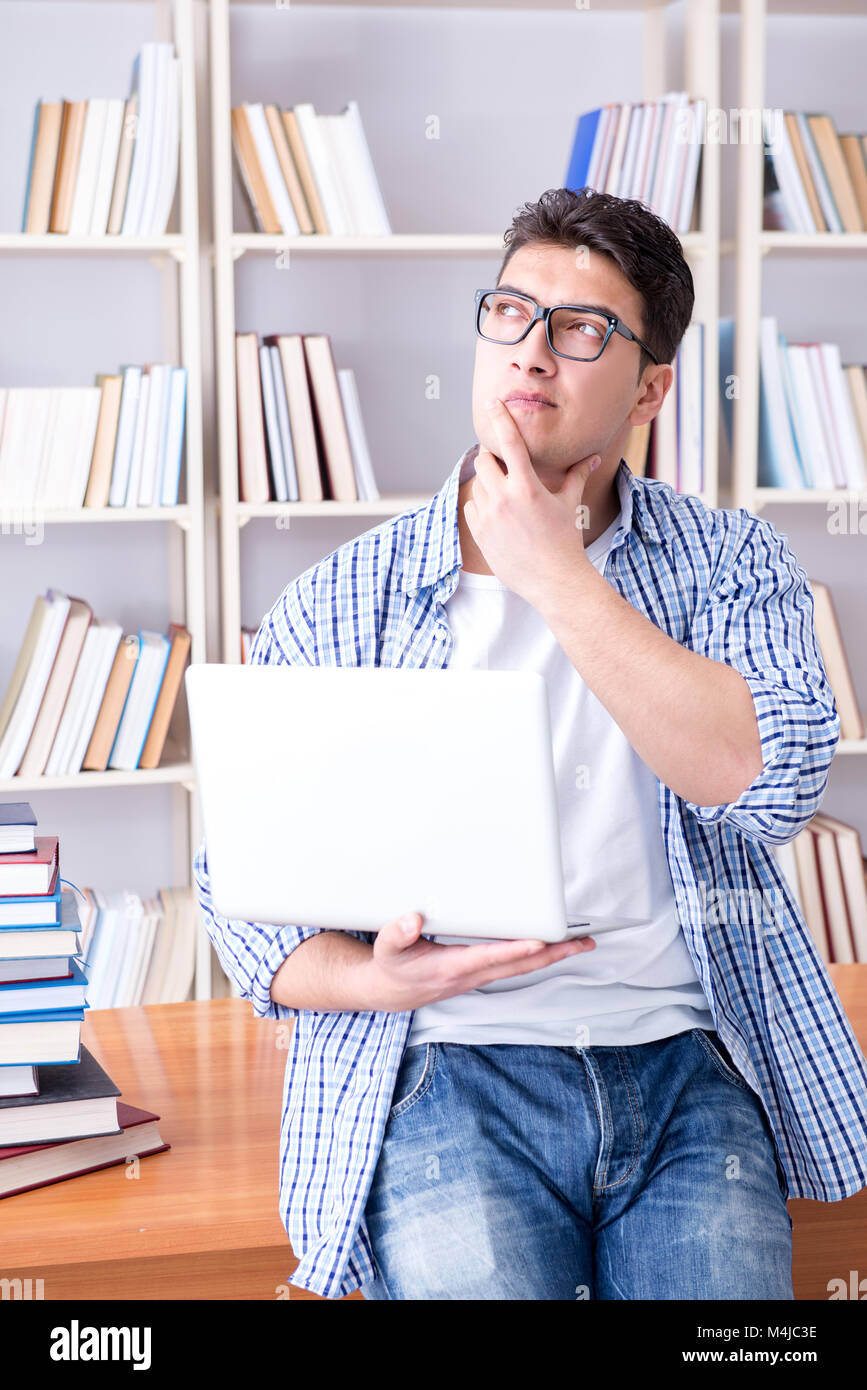 Young student with books preparing for exams Stock Photo - Alamy