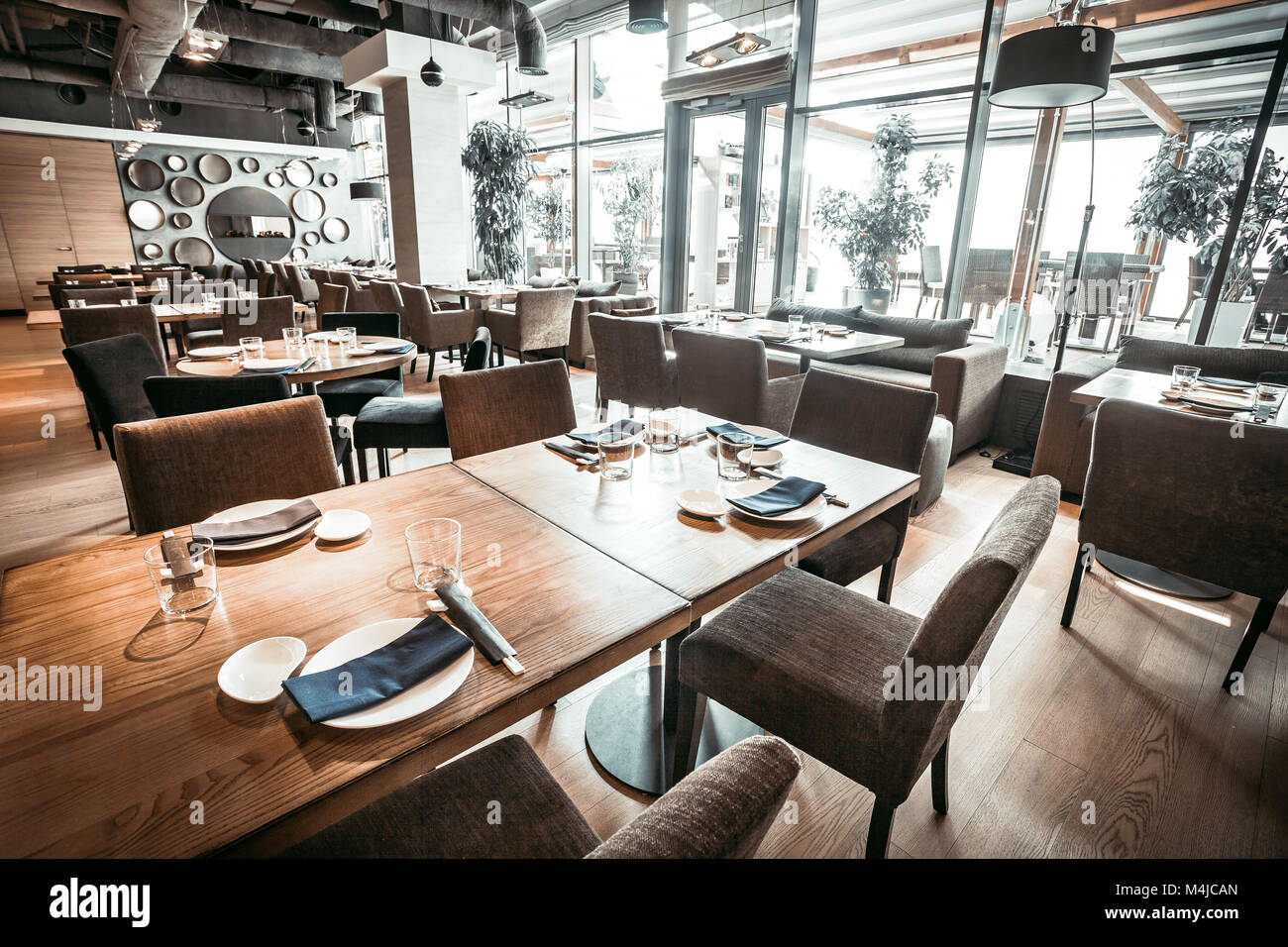 Spectacular interior of the contemporary restaurant in stylish grey ...