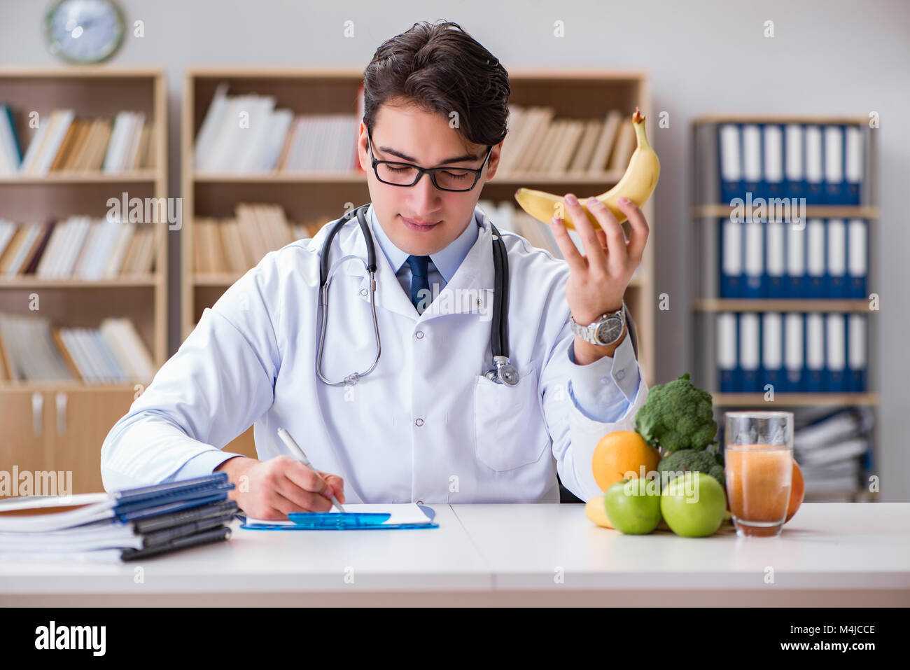 Scientist studying nutrition in various food Stock Photo - Alamy