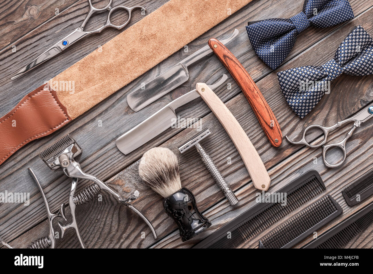 Vintage barber shop tools on wooden background Stock Photo - Alamy