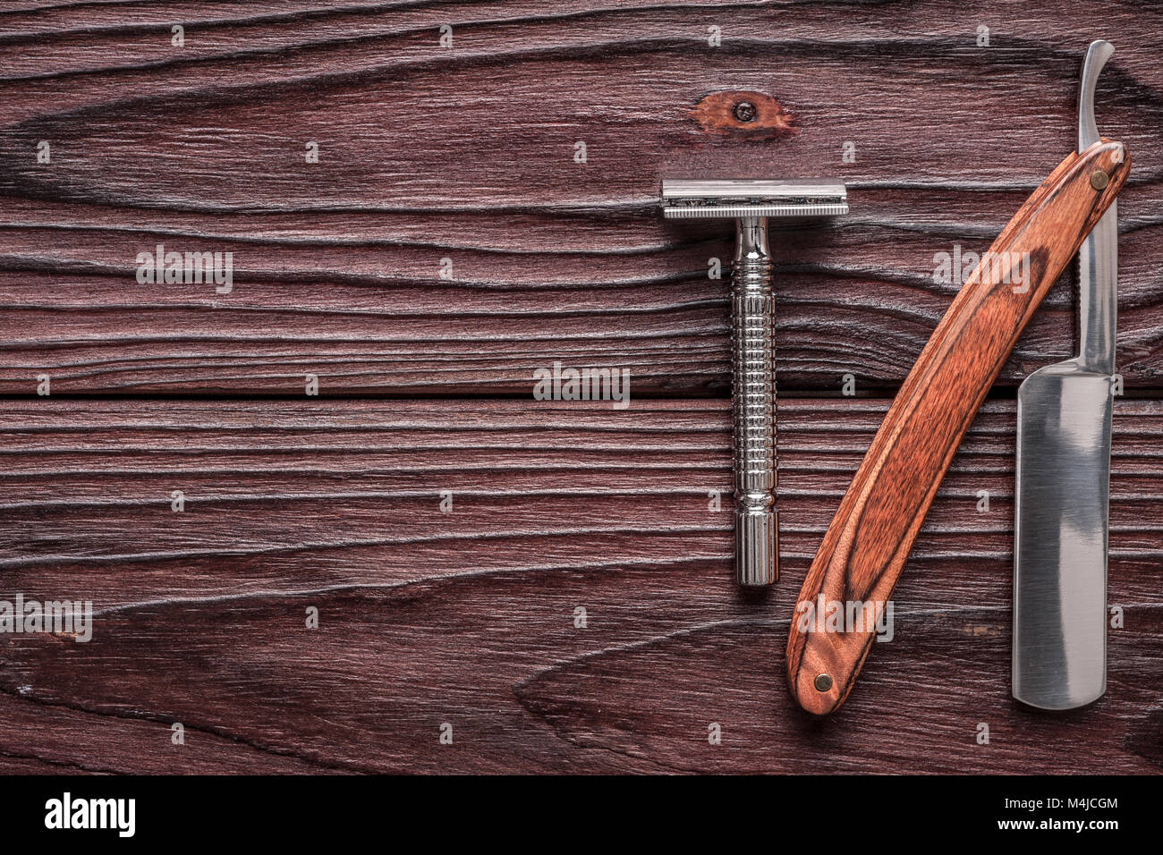 Vintage barber shop razor tools on wooden background Stock Photo - Alamy