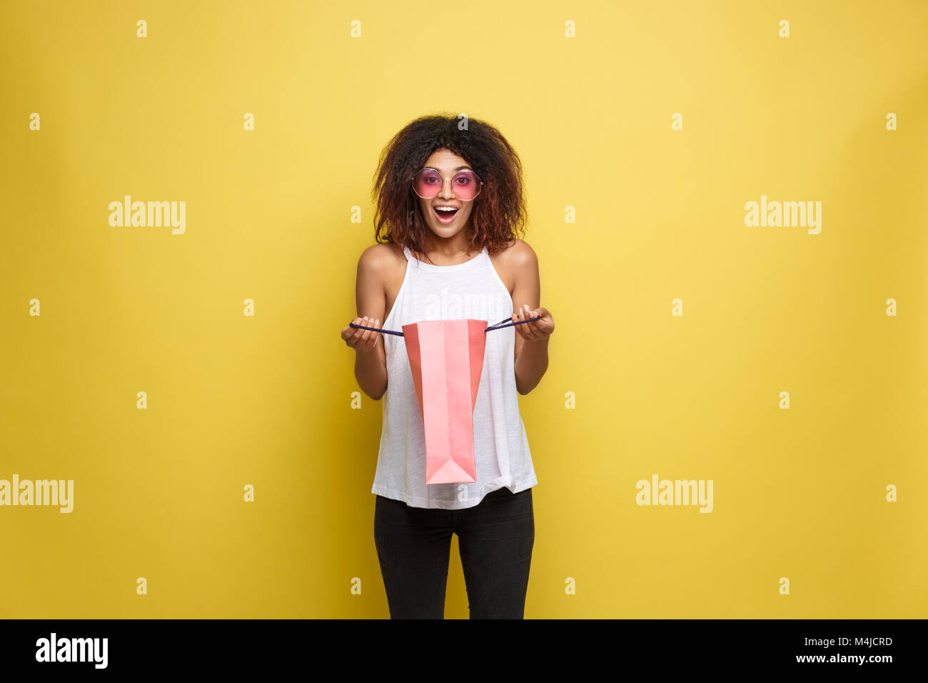 Shopping Concept - Close up Portrait young beautiful attractive African ...