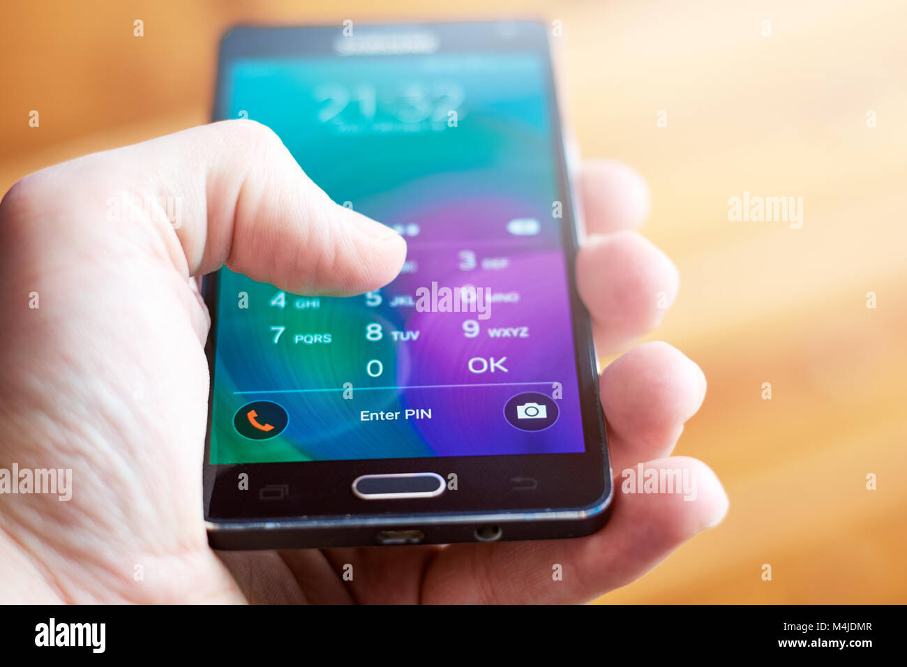 BUENOS AIRES, ARGENTINA - FEBRUARY 15, 2018: A person holding a mobile ...