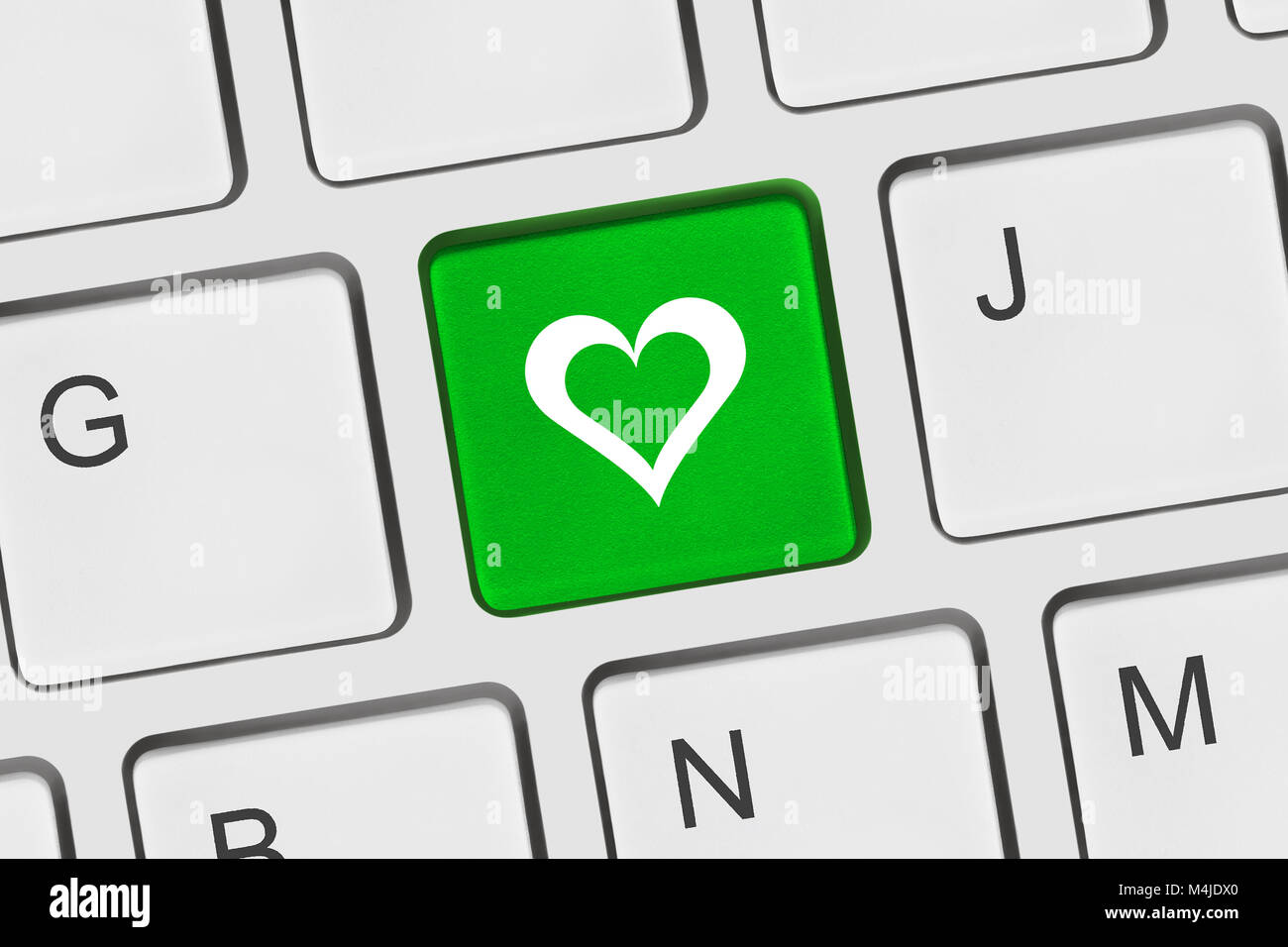 Computer keyboard with love key Stock Photo - Alamy