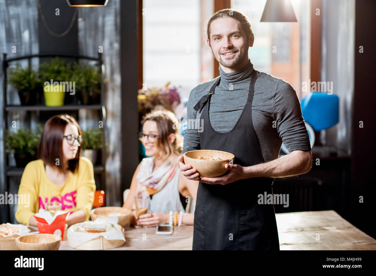 Serving asian meal at the restaurant Stock Photo - Alamy