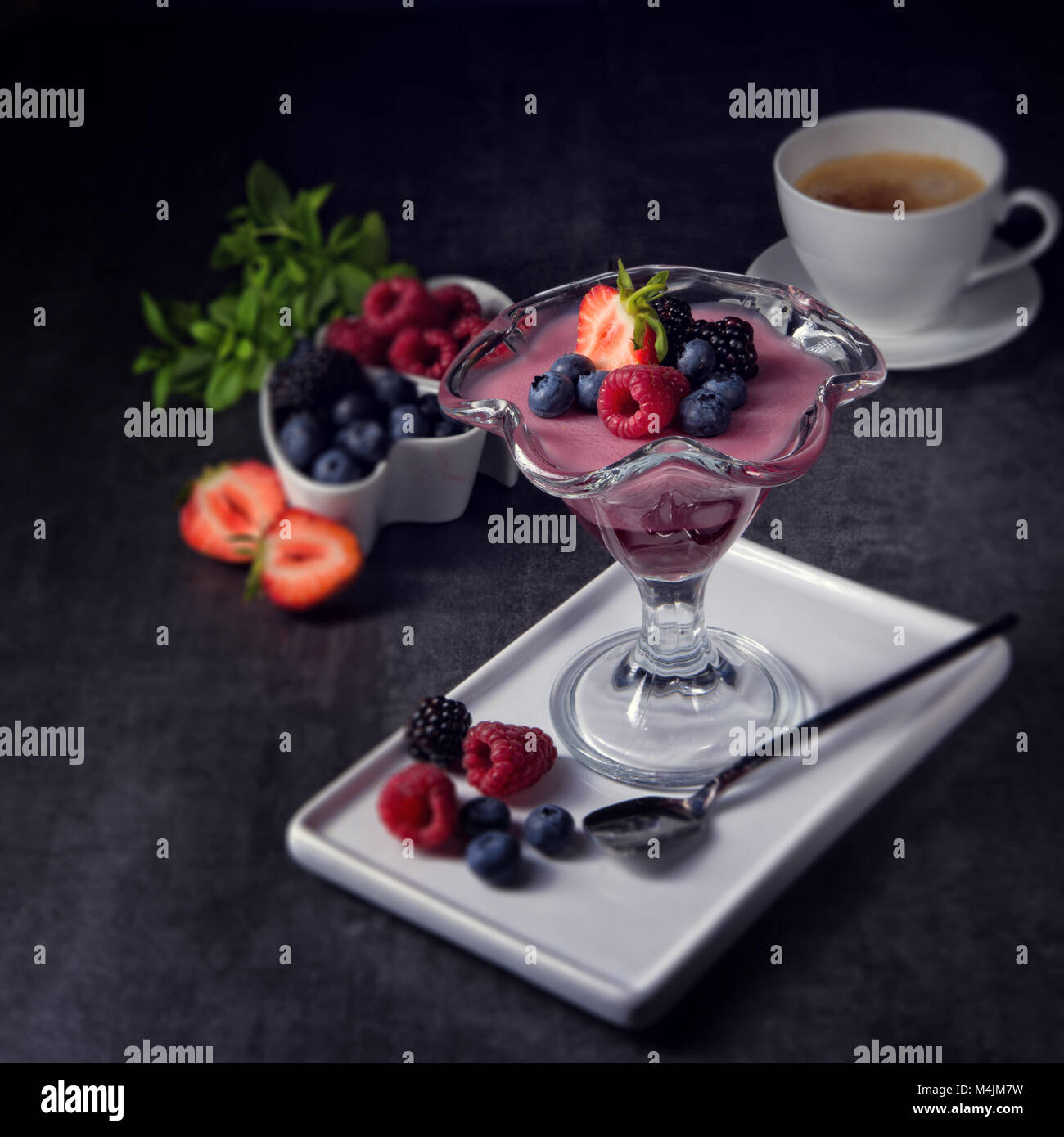 delicious pudding with wild berry Stock Photo - Alamy