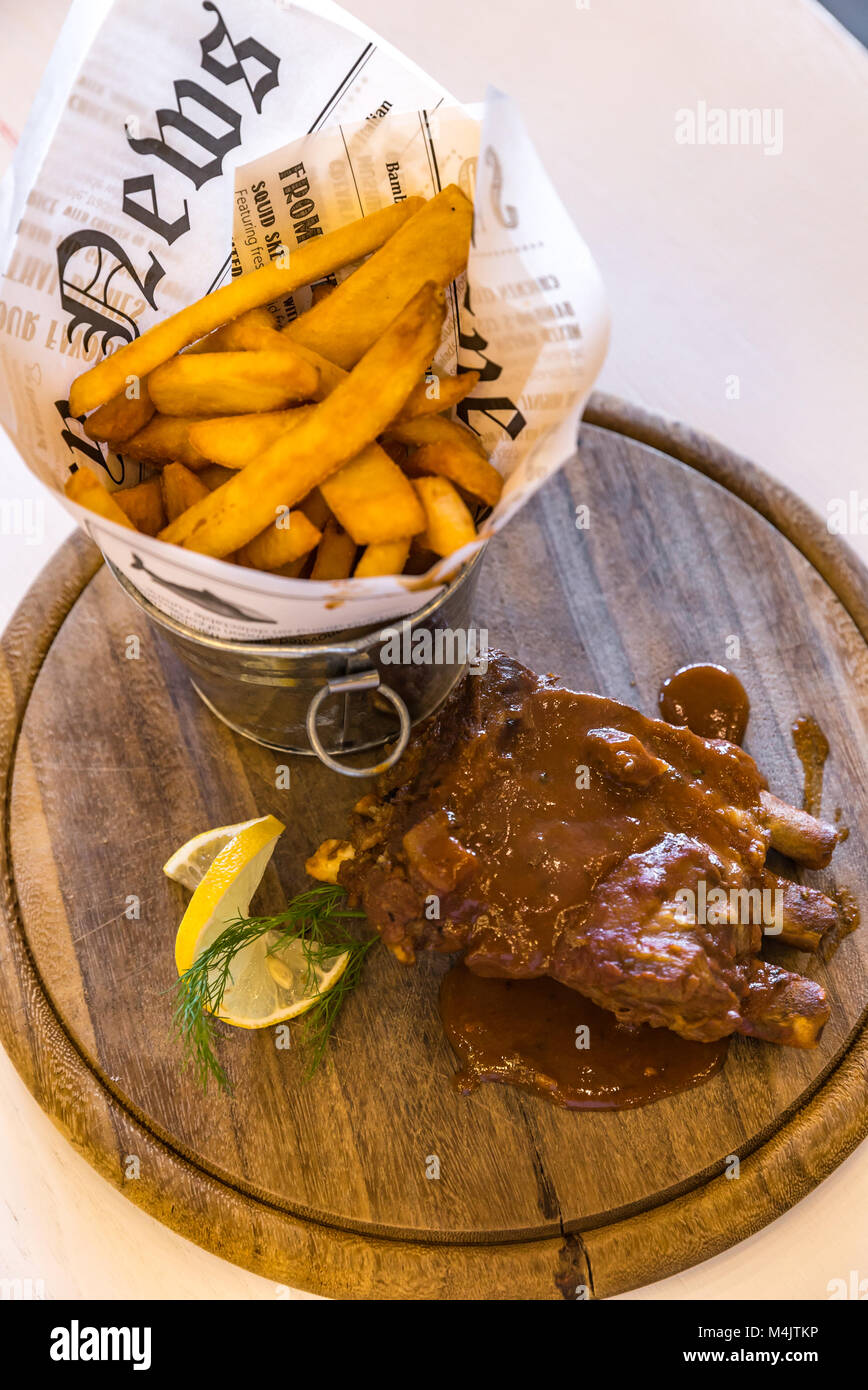 Pork Rib with Fries Stock Photo - Alamy