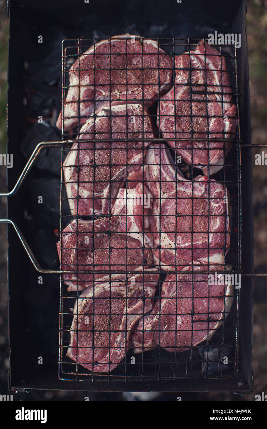 Grilling fresh entrecote pork Stock Photo - Alamy