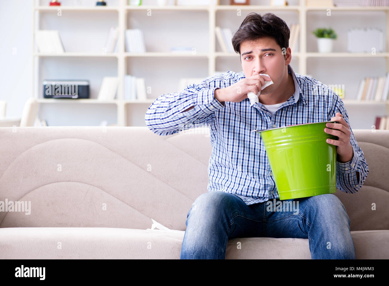Man suffering from sick stomach and vomiting Stock Photo - Alamy