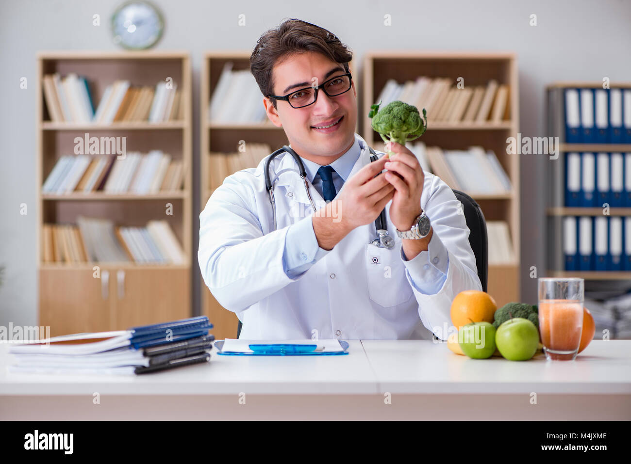 Scientist studying nutrition in various food Stock Photo - Alamy