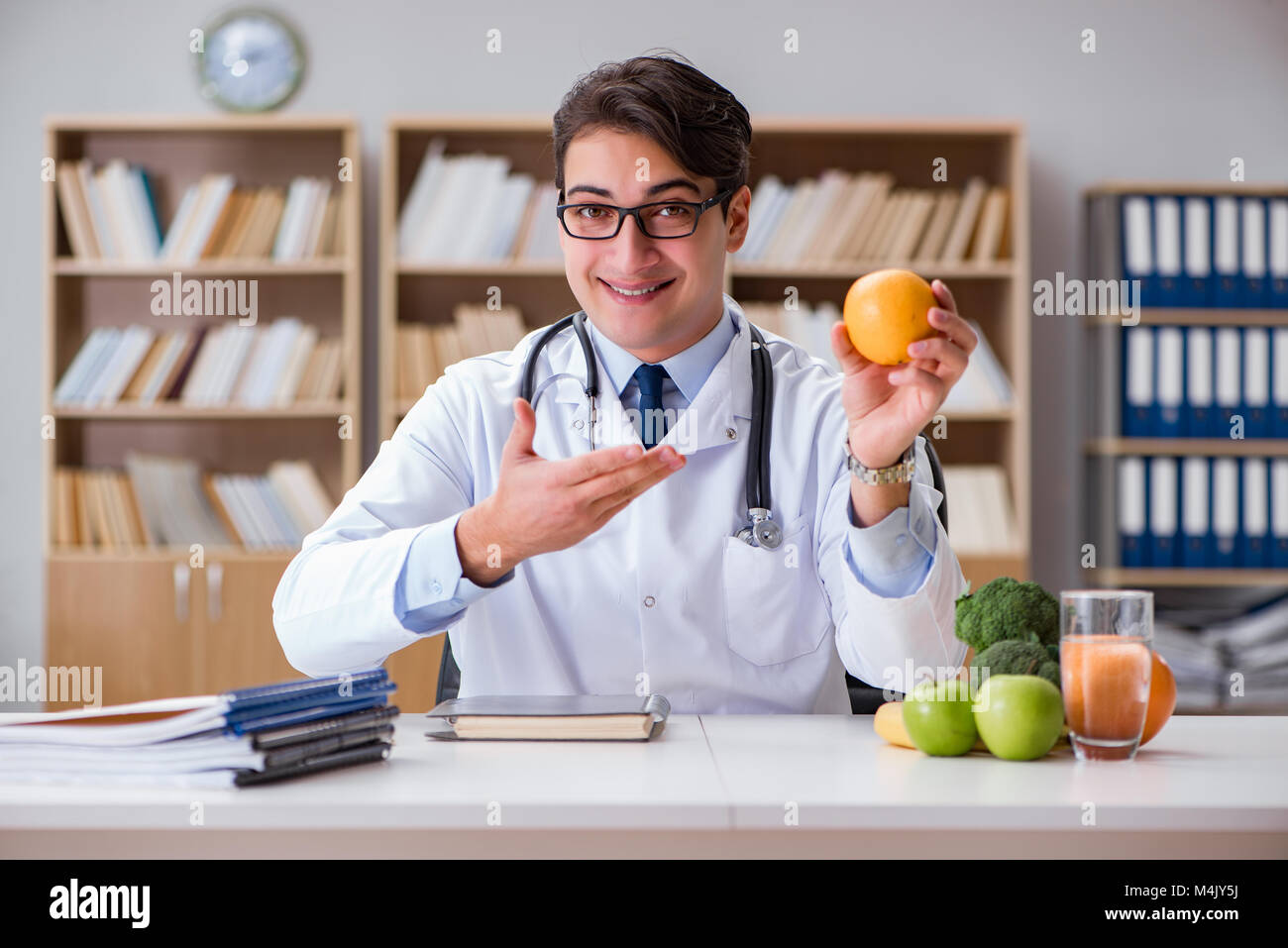 Scientist studying nutrition in various food Stock Photo - Alamy