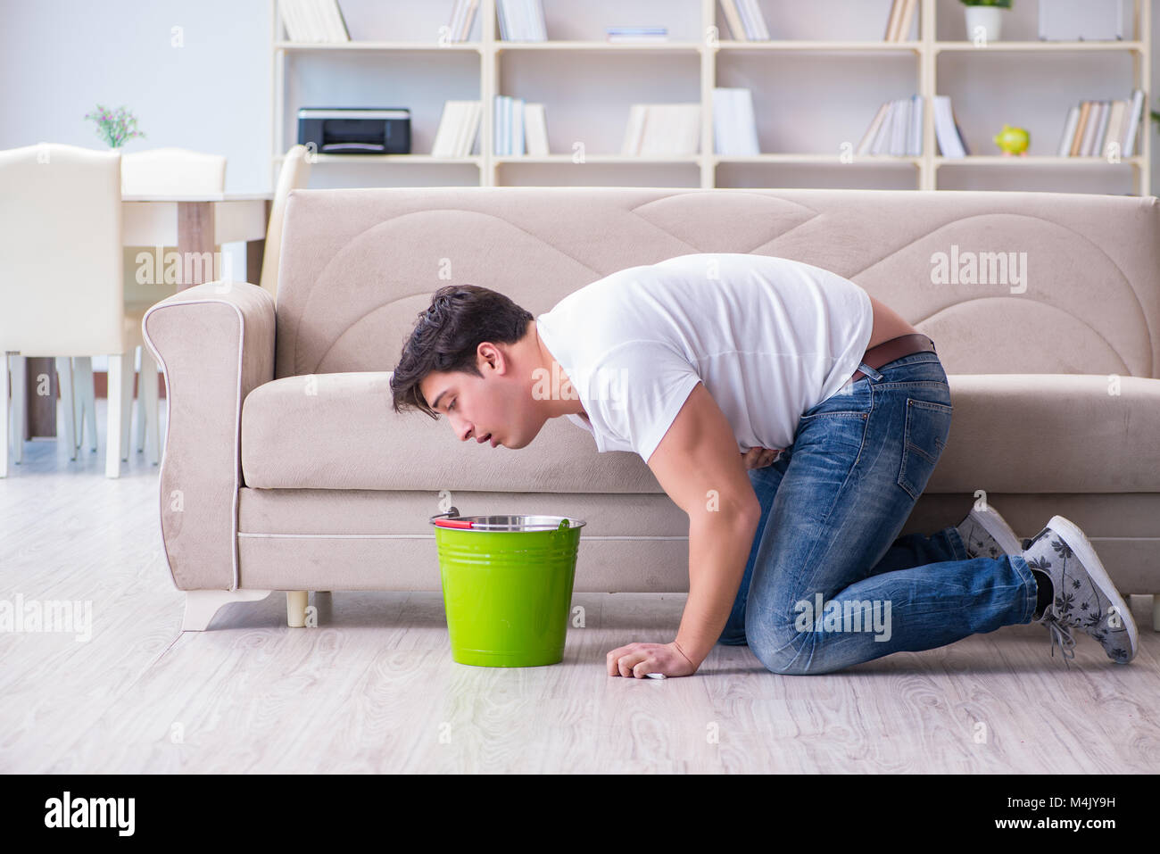 Man suffering from sick stomach and vomiting Stock Photo - Alamy