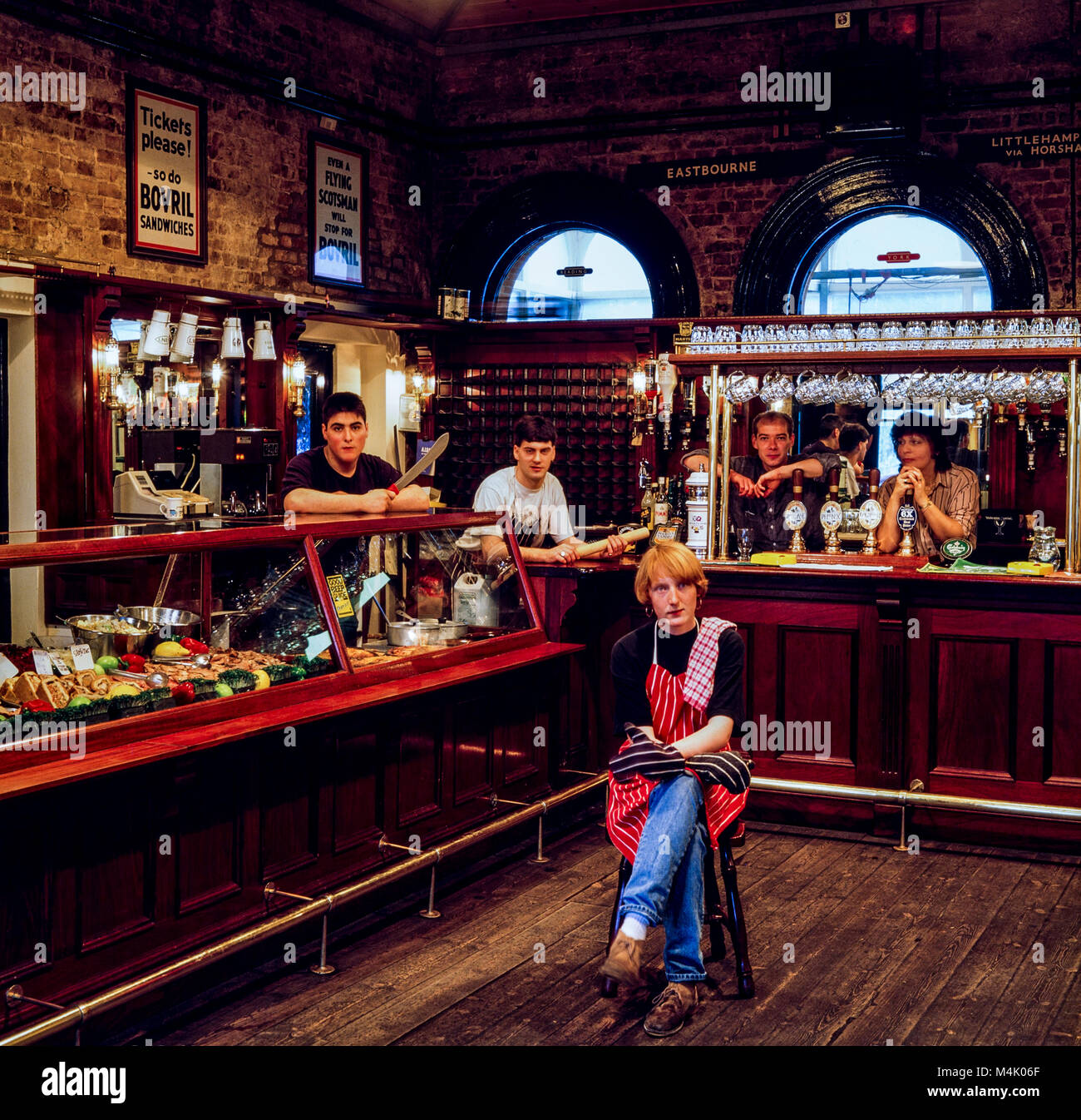 Staff pose for a photo in the Phoenix and Firkin pub, old ticket hall ...