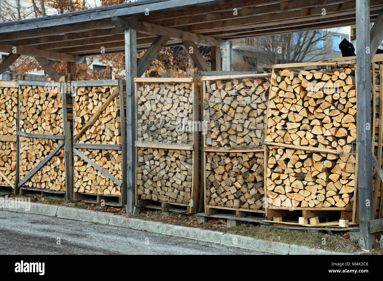 big woodshed with cutted wooden logs in winter Stock Photo - Alamy
