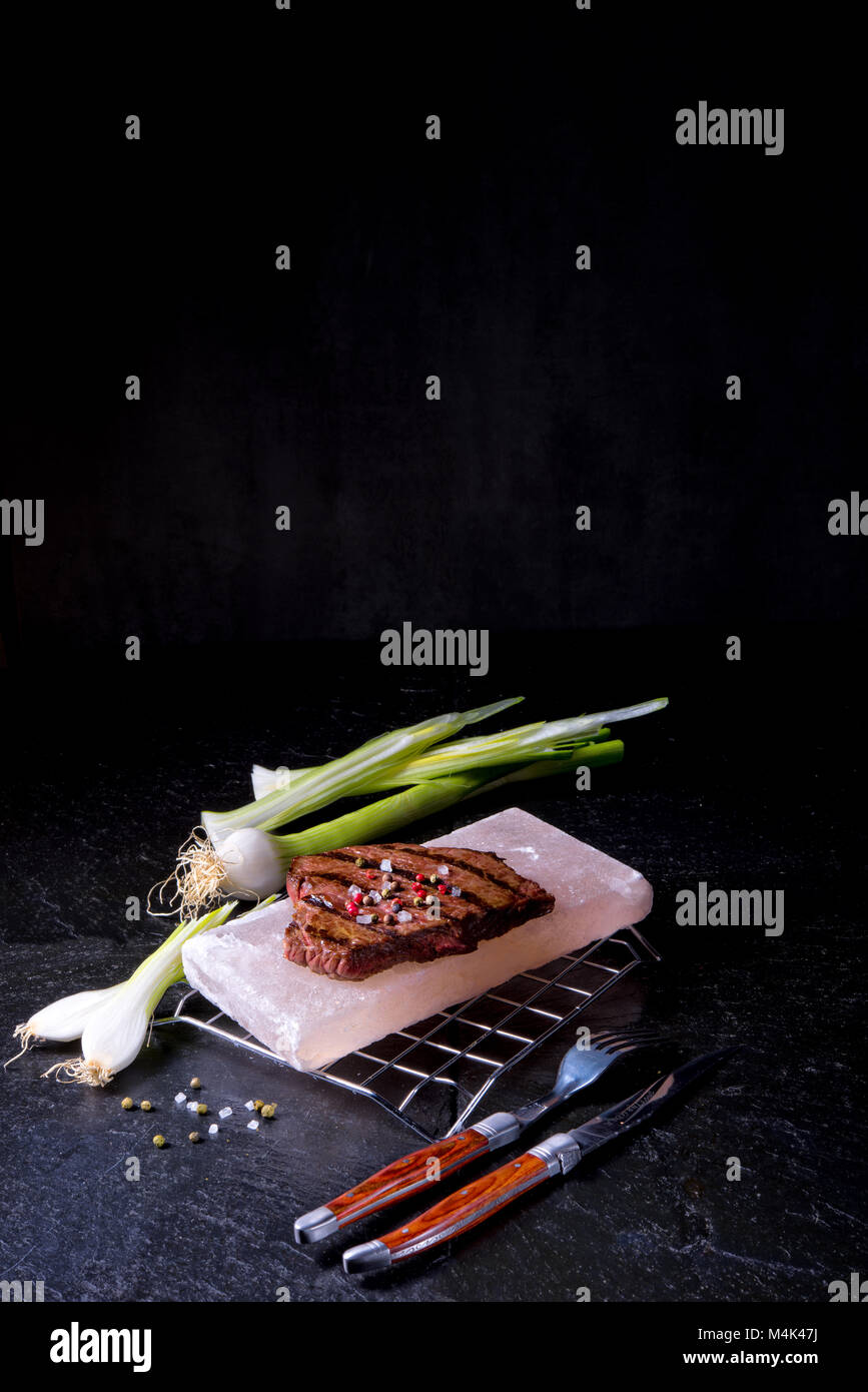 Steak on hot salt stone Stock Photo - Alamy