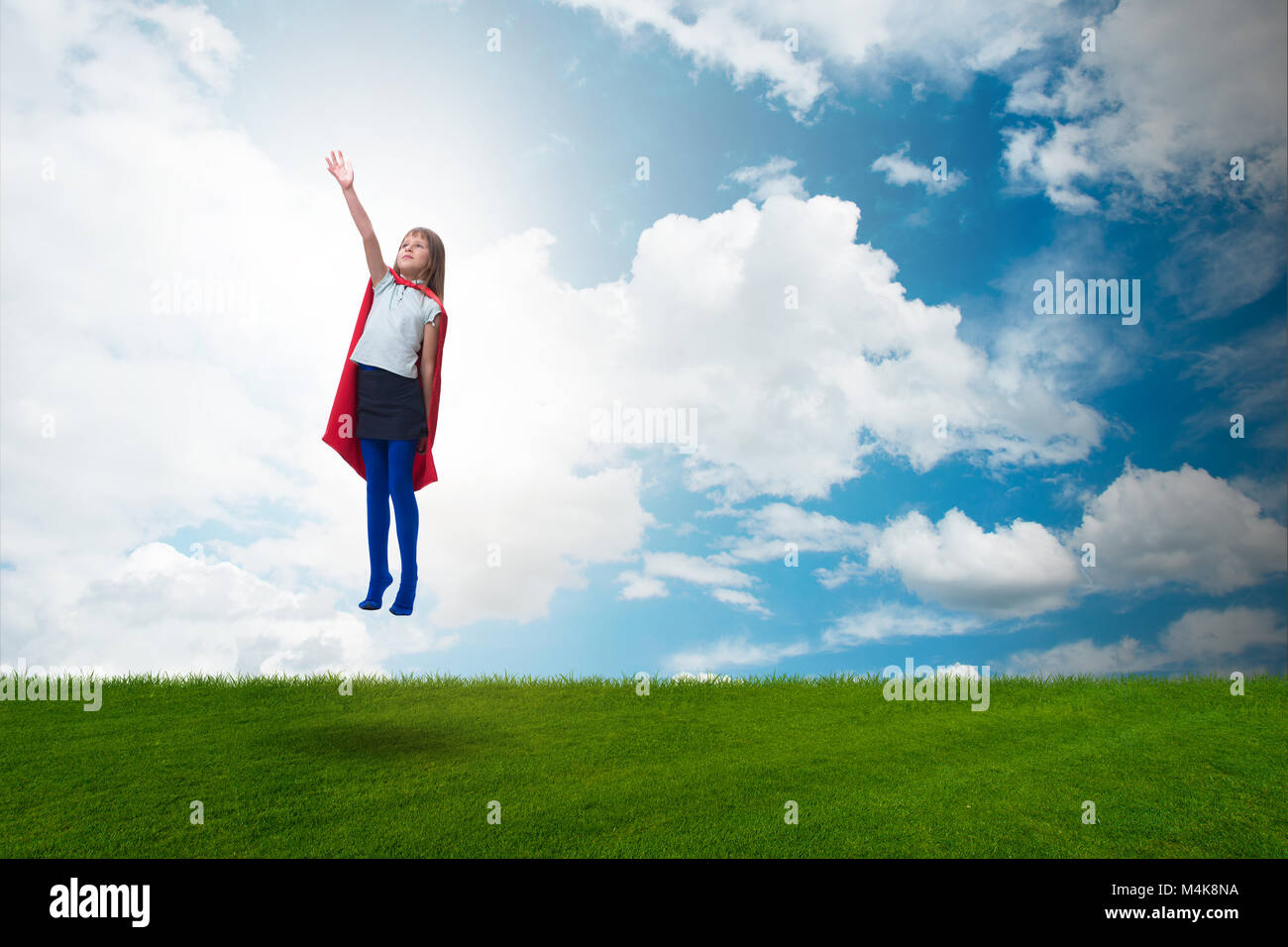 Superhero kid flying in dream concept Stock Photo - Alamy