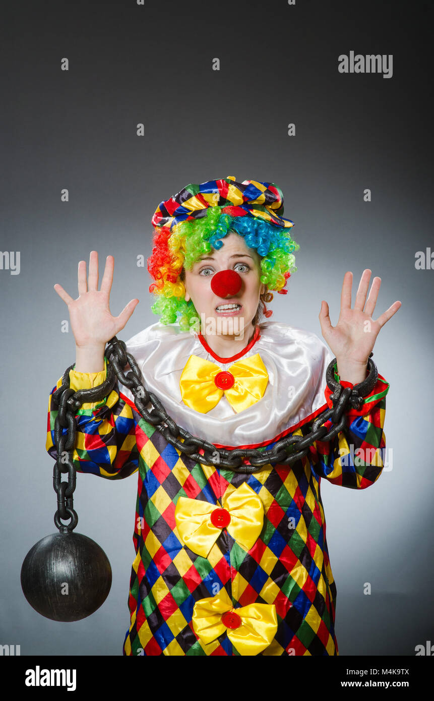 Funny clown in comical concept Stock Photo - Alamy