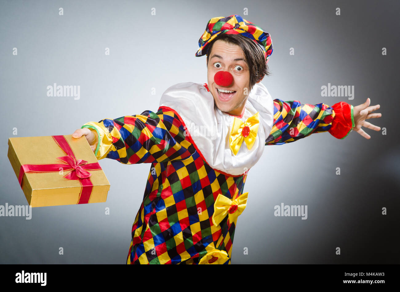 Funny clown in comical concept Stock Photo - Alamy