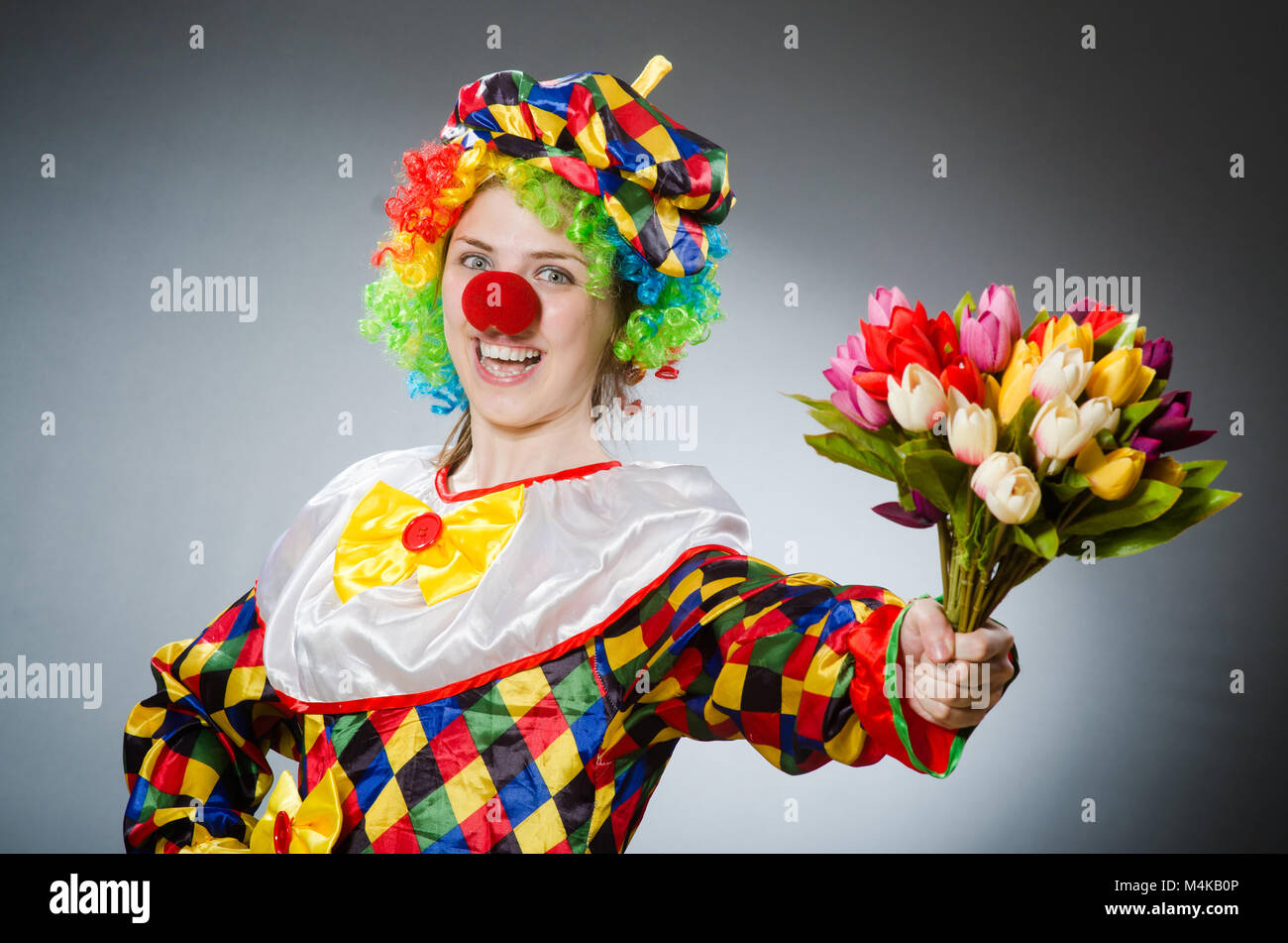 Funny clown in comical concept Stock Photo - Alamy