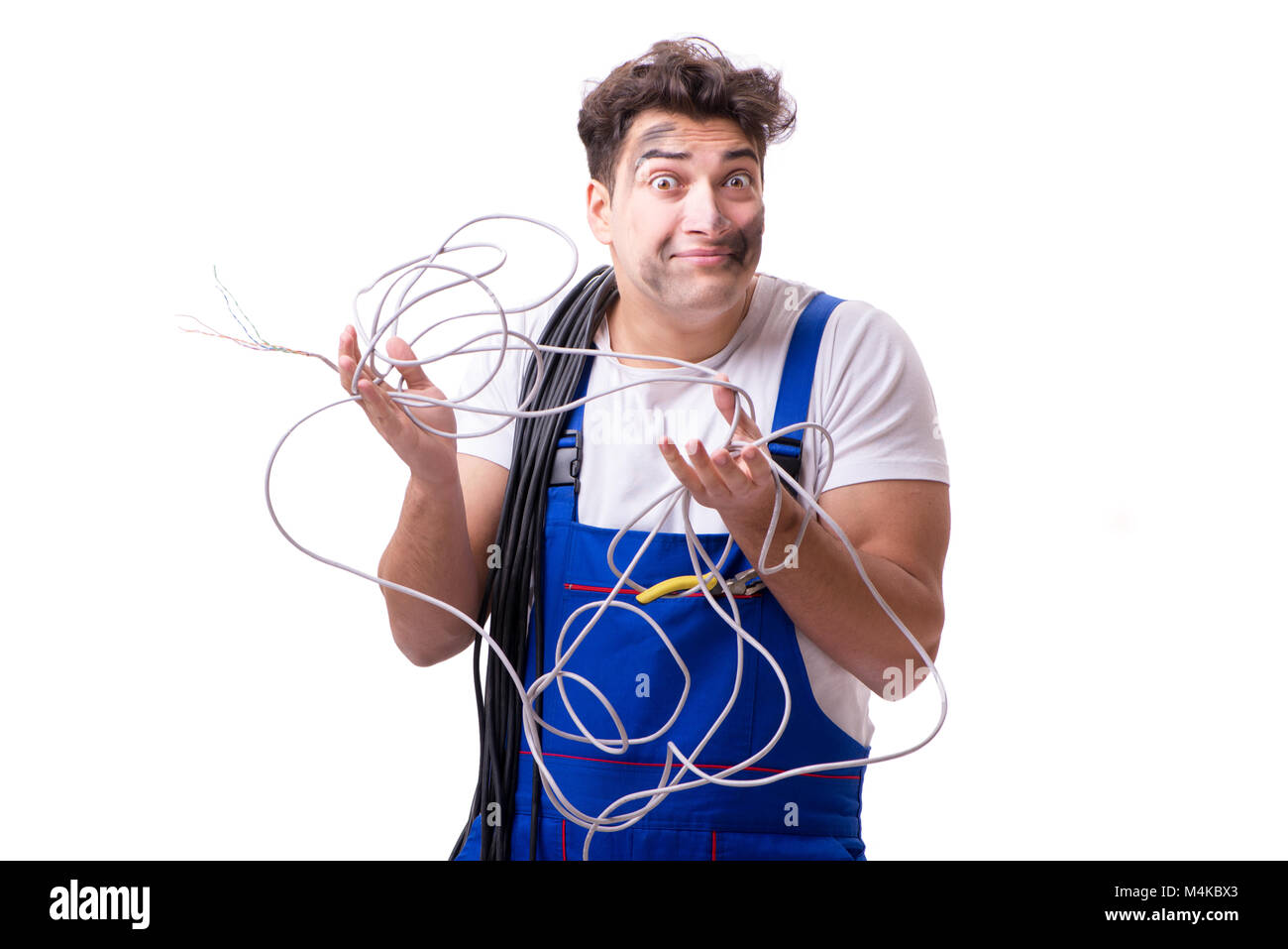 Funny man doing electrical repair Stock Photo - Alamy