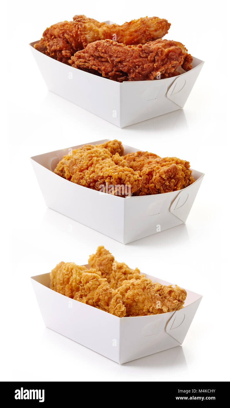 Fried breaded chicken in white cardboard boxes isolated on white ...