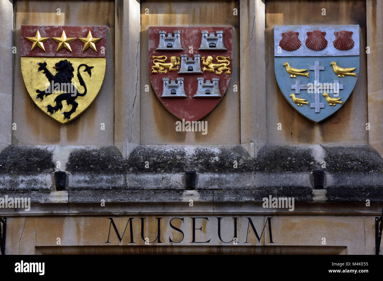 heraldic crests and coats of arms above the entrance to winchester ...