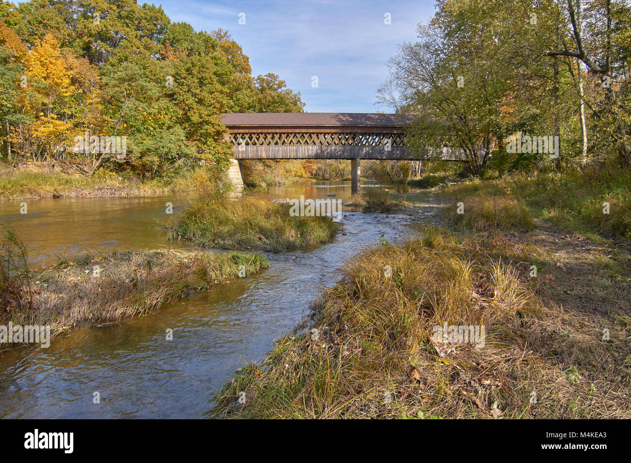 Wooden covered bridge in Fall Season;NE state of Ohio Stock Photo - Alamy