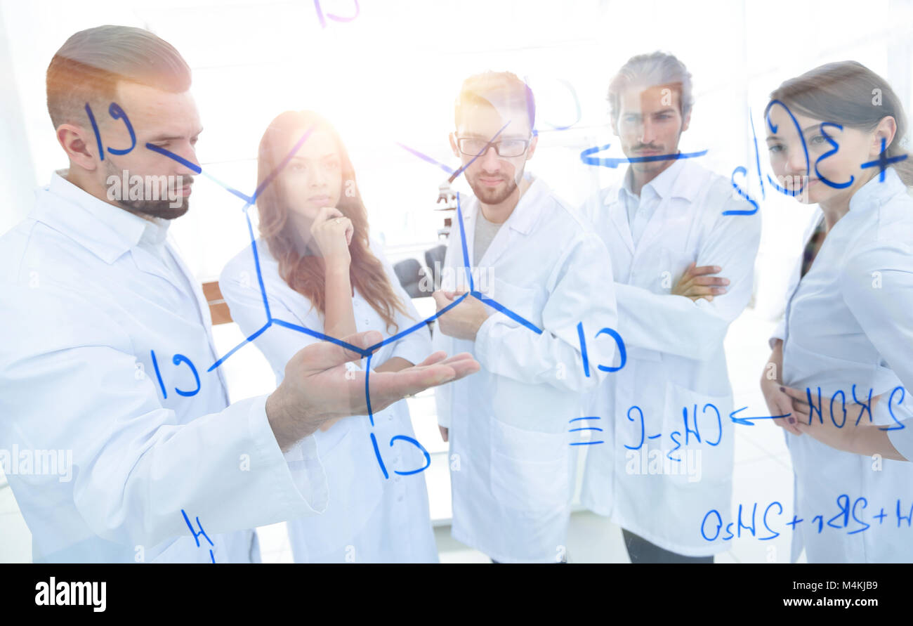 group of laboratory employees.Molecular Structure Chemistry Science ...