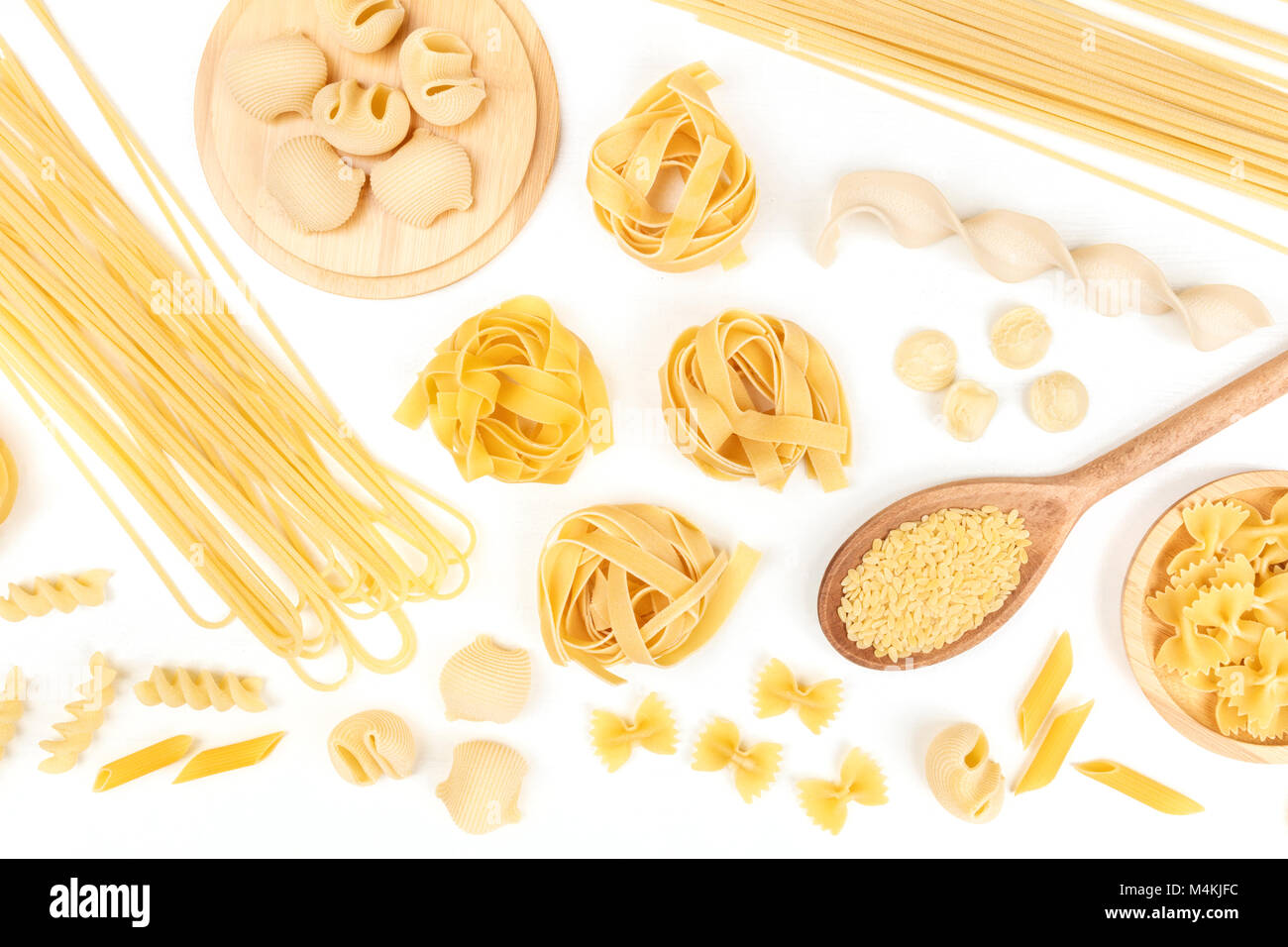 An overhead photo of different types of pasta, including spaghetti ...