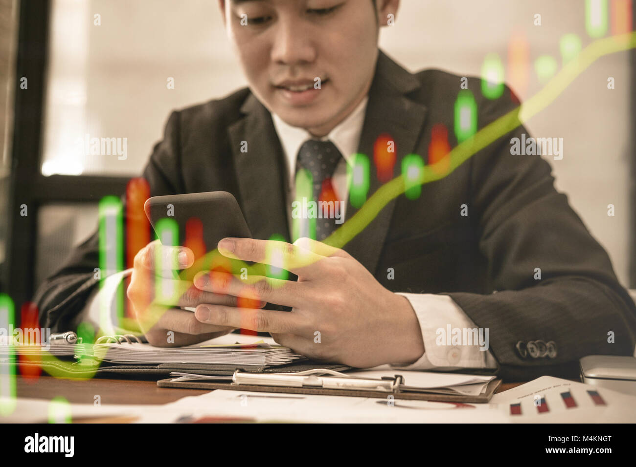 young businessman holding smartphone & using app. man texting message ...