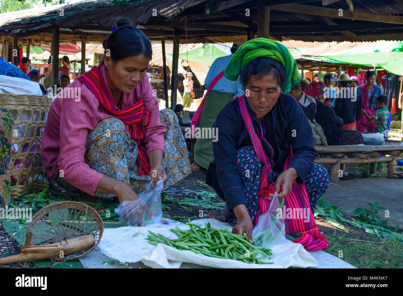 Maing Thauk: rotating market, vendor woman women, Intha people, fruit ...